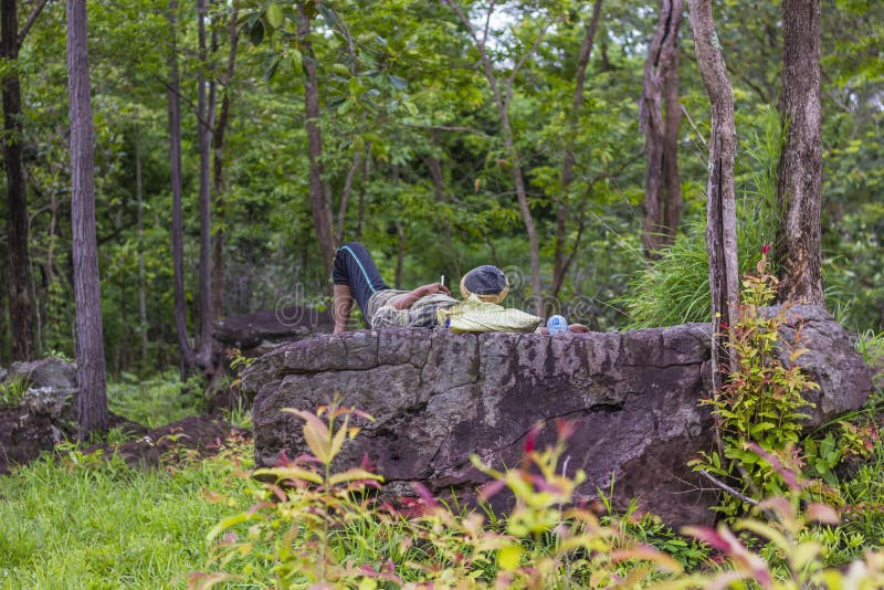 Asian Cowboys Sleeping on Rocks in Forest. Editorial Image - Image of ...