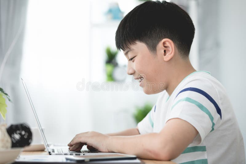 1,331 Young Chinese Boy Using Computer Stock Photos - Free & Royalty ...
