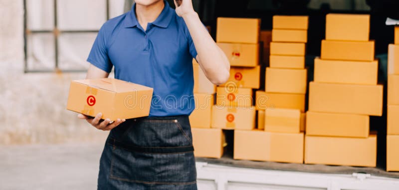 Asian Delivery Man in Cargo Van Checking Boxes Stock Photo - Image of ...