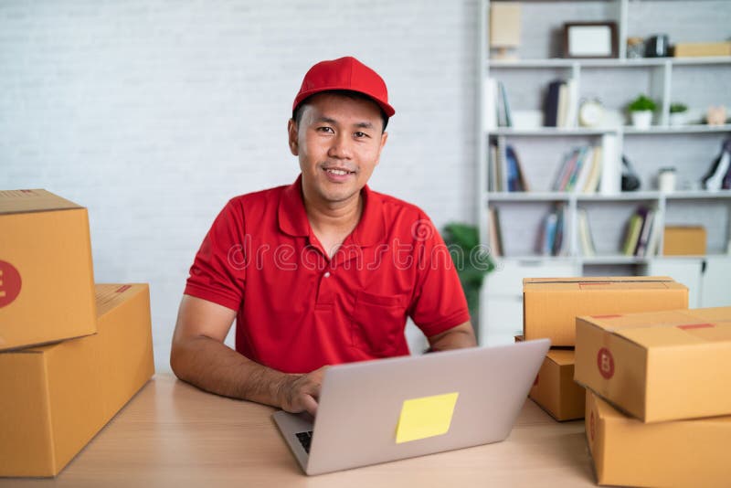 Asian Delivery Man Worker Smiling Using Mobile Scan Barcode for Boxes ...