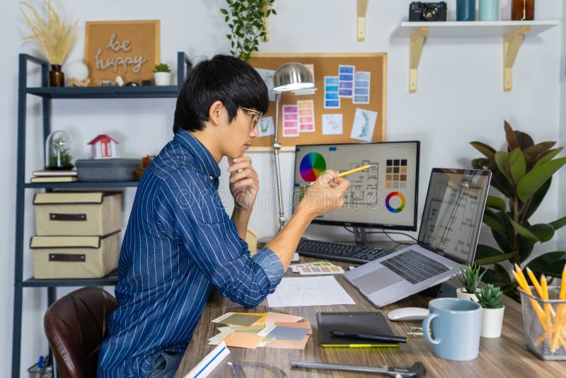 Asian Designer or Creative Occupation Design Studio Artist Working on ...