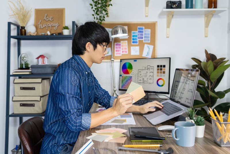 Asian Designer or Creative Occupation Design Studio Artist Working on ...