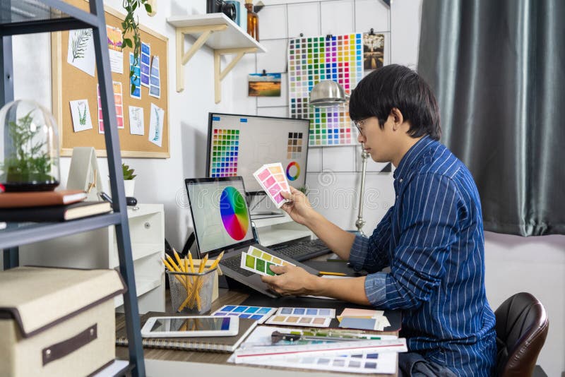 Asian Designer or Creative Occupation Design Studio Artist Working on ...