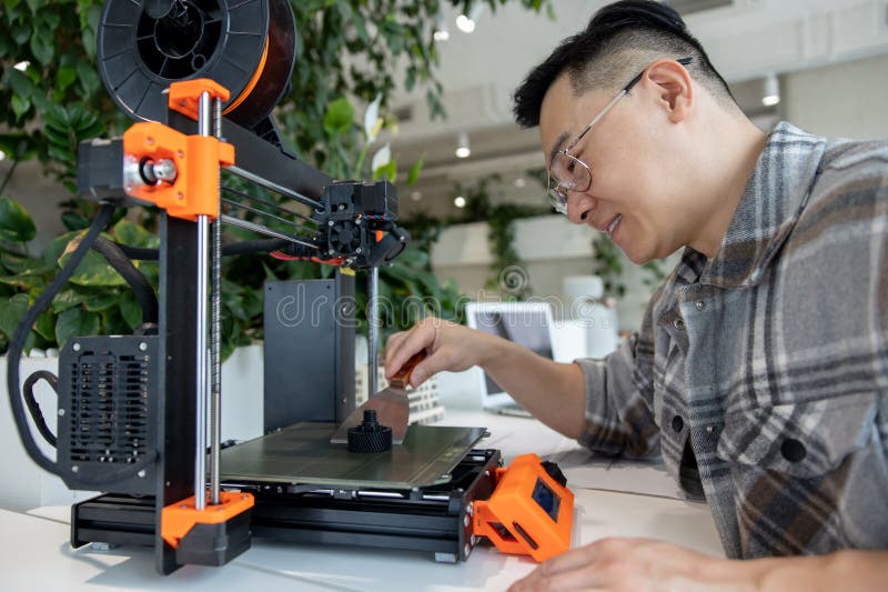 Asian Designer Engineer Using 3d Printer Laboratory Studying Product ...