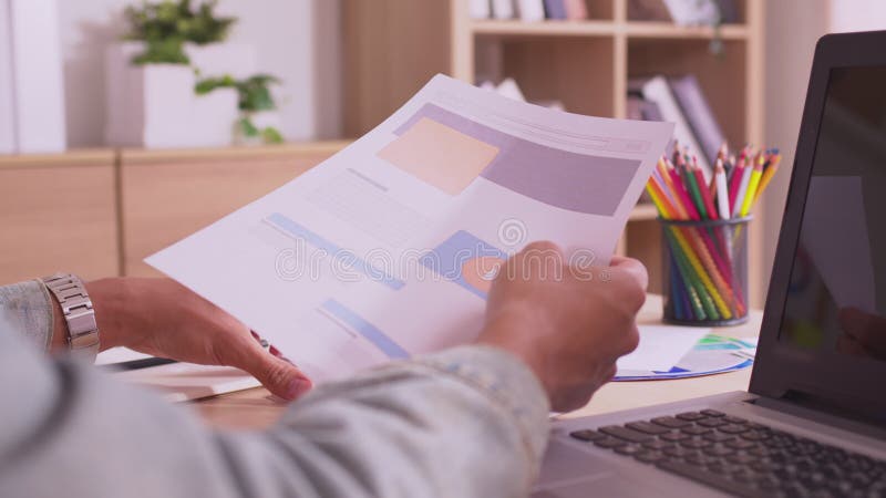 Asian Designer Hold a Layout with Different Colors and Select Colors ...