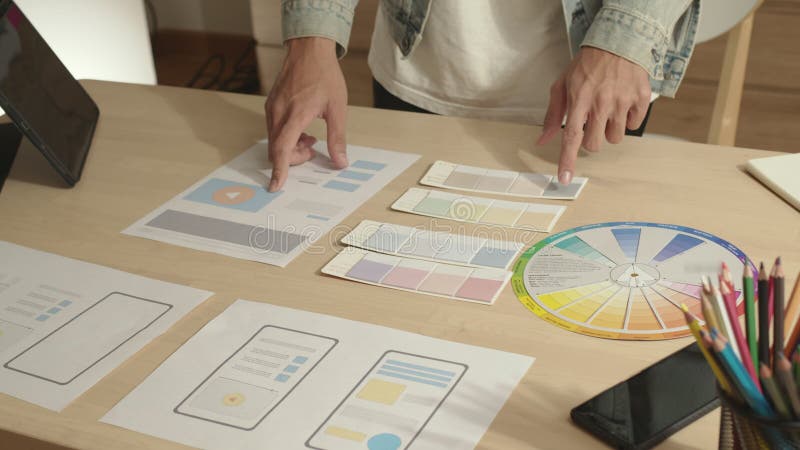 Asian Designer Hold a Layout with Different Colors and Select Colors ...