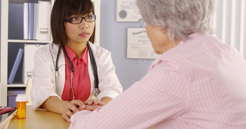 Nurse Caring Elderly Woman At Home Stock Image - Image of examination ...