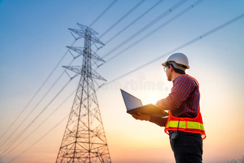 Asian Electrical Engineers Checking Location Using a Notebook Computer ...