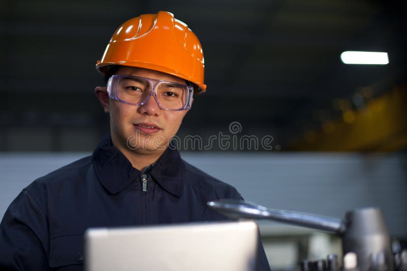 Asian Technician at Tool Workshop Stock Photo - Image of safety ...
