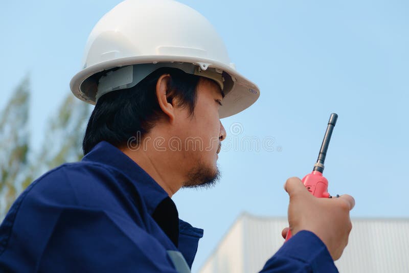 Asian Engineer in Blue Safety Collar Uniform and White Security Stock ...
