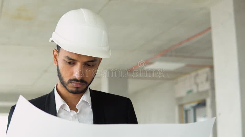 Asian Engineer Handsome Man or Architect Looking Construction Plan with ...