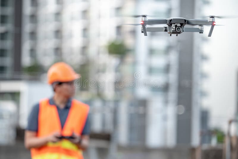 Asian Engineer Man Flying Drone Over Construction Site Stock Photo ...