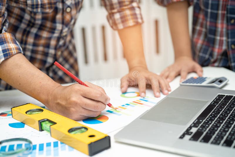 Asian Engineer and Partner Team Learn and Talk with House Plan Project ...