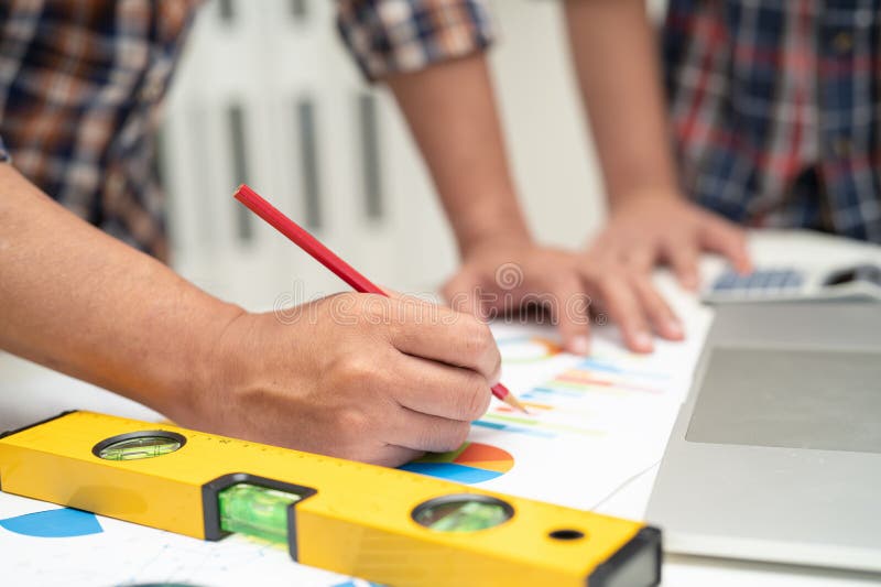 Asian Engineer and Partner Team Learn and Talk with House Plan Project ...