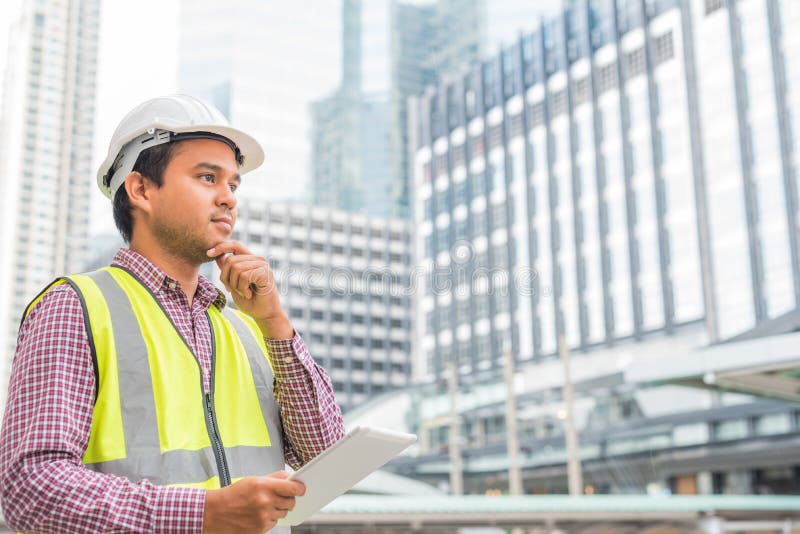 Asian Civil Engineer Working at Building Site. Stock Photo - Image of ...