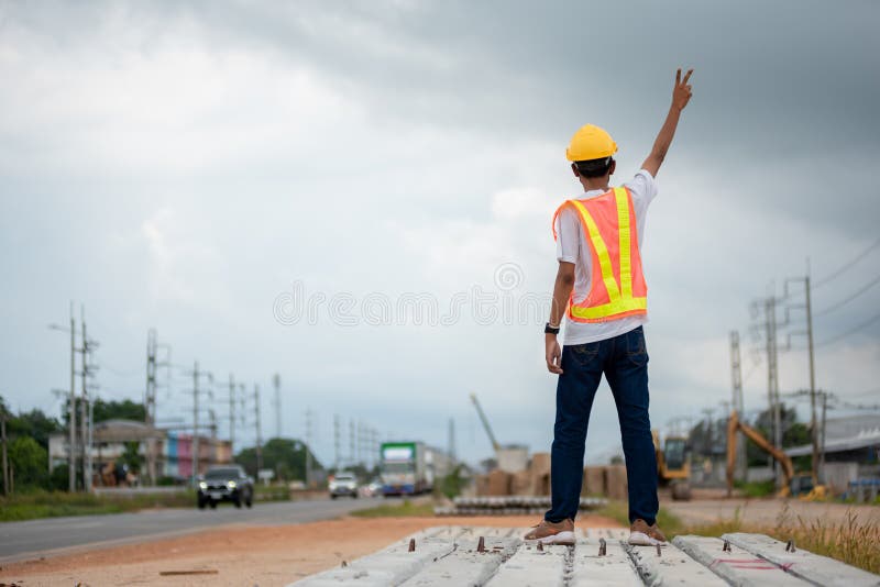 Asian Engineering Worker Wearing Hard Hat and Protective Vest Standing ...