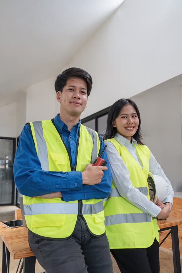 Asian Engineers Team, Working Together in an Construction Site Stock ...