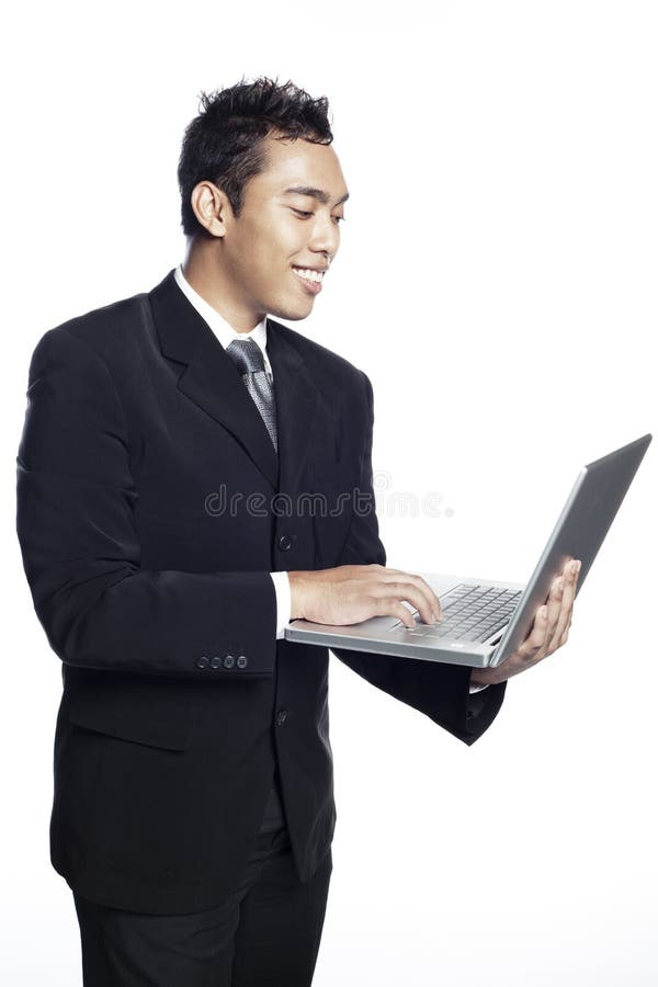 Asian Entrepreneur Looking at Laptop Computer Stock Image - Image of ...