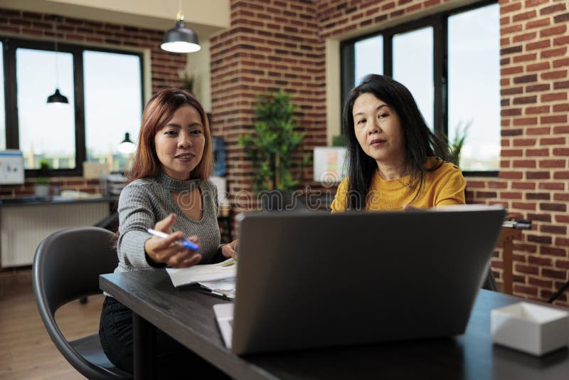 Asian Executive Managers Analyzing Management Graphs Stock Image ...