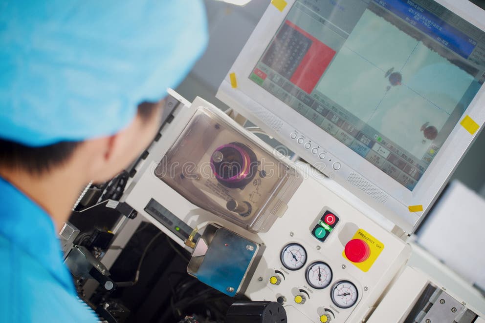 Asian Factory Worker Look on the Technician Screen Stock Image - Image ...