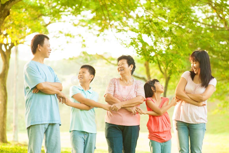 Asian family stock photo. Image of grass, malaysian, family - 27898446