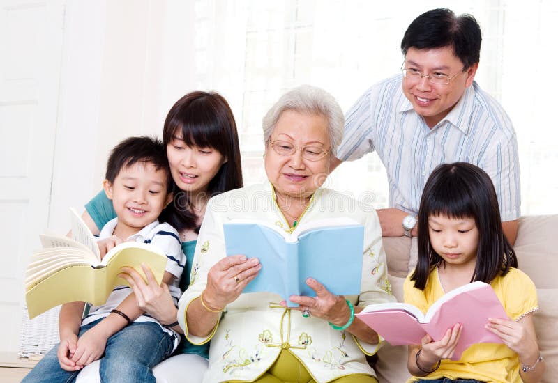 Asian family reading stock image. Image of elder, mother - 31571031