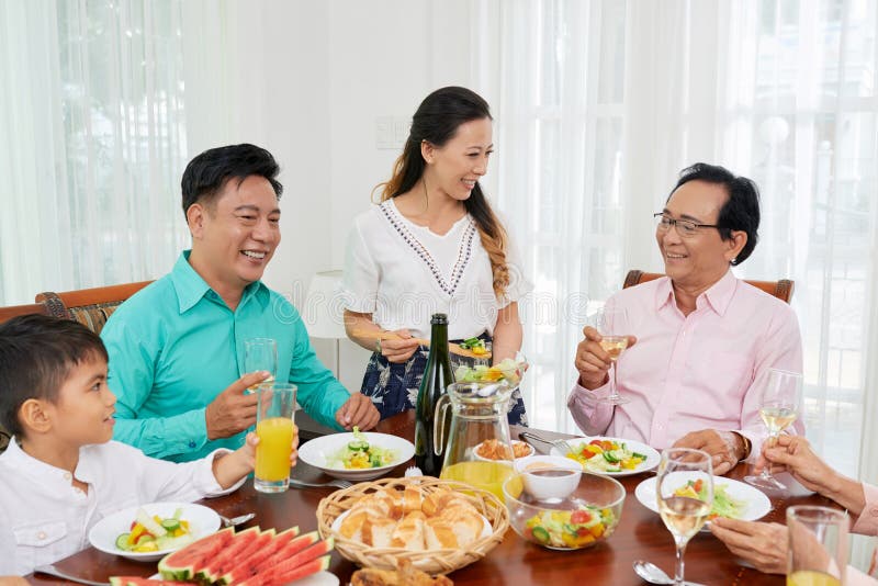 Multi-generational Asian Family Gathering on Sofa Stock Image - Image ... Multi-generational Asian Family Gathering on Sofa Stock Image - Image ...