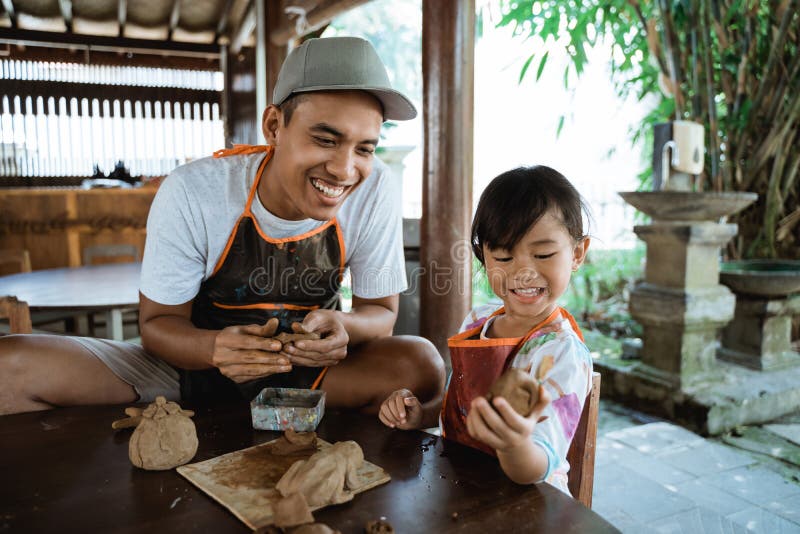Asian Father and Daughter Working with Clay Stock Image - Image of ...