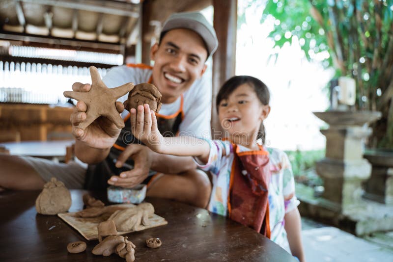 Asian Father and Daughter Working with Clay Stock Photo - Image of ...