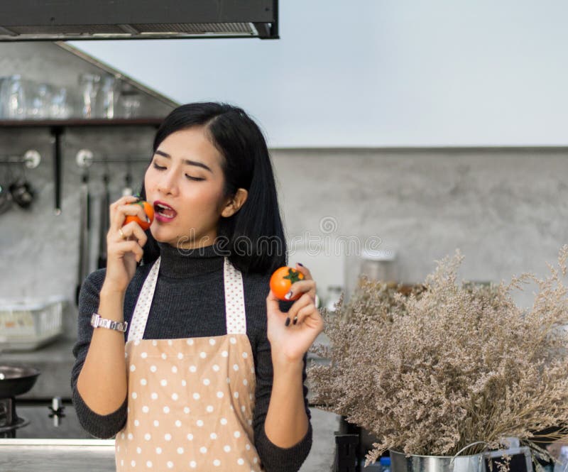 Asian Female Chef is Cooking Stock Photo - Image of control, cooking ...