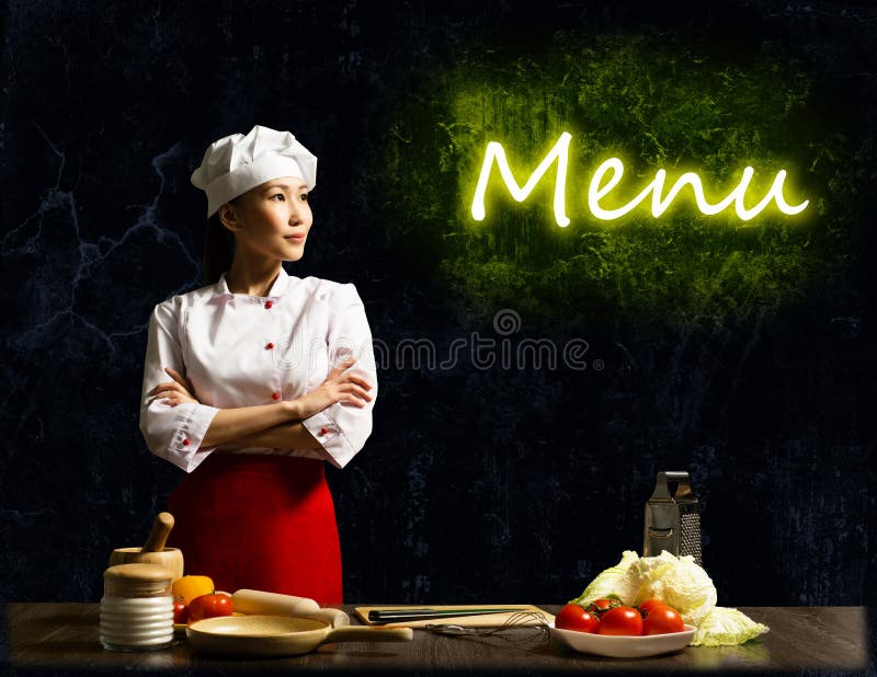 Asian Female Chef Looking at the Glowing Menu Stock Image - Image of ...