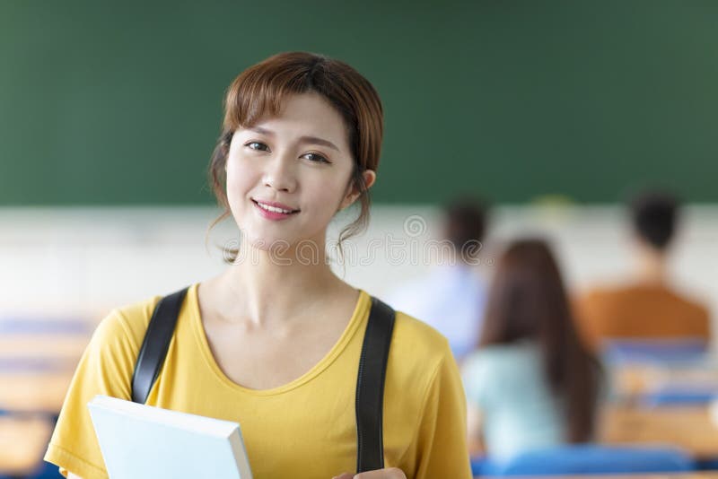 Female College Student in Classroom Stock Photo - Image of studying ...