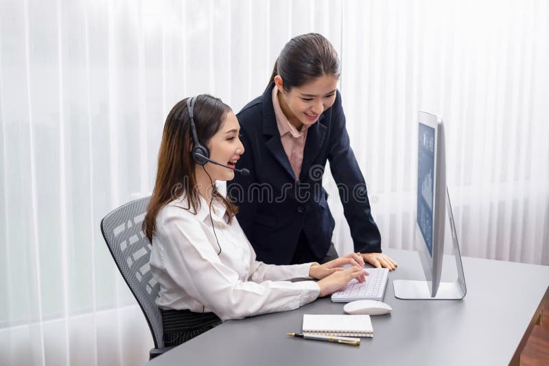 Asian Female Customer Support Operator Guided by Manger Enthusiastic ...