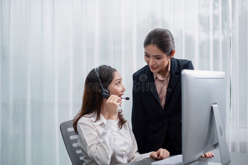 Asian Female Customer Support Operator Guided by Manger Enthusiastic ...