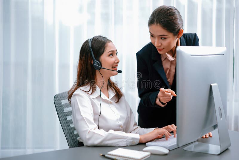 Asian Female Customer Support Operator Guided by Manger Enthusiastic ...