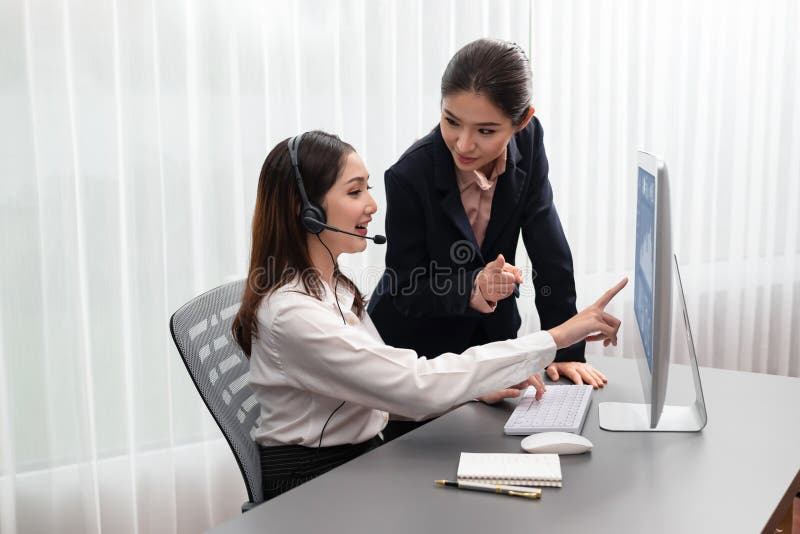Enthusiastic Asian Call Center with Headset on Her Workplace Portrait ...