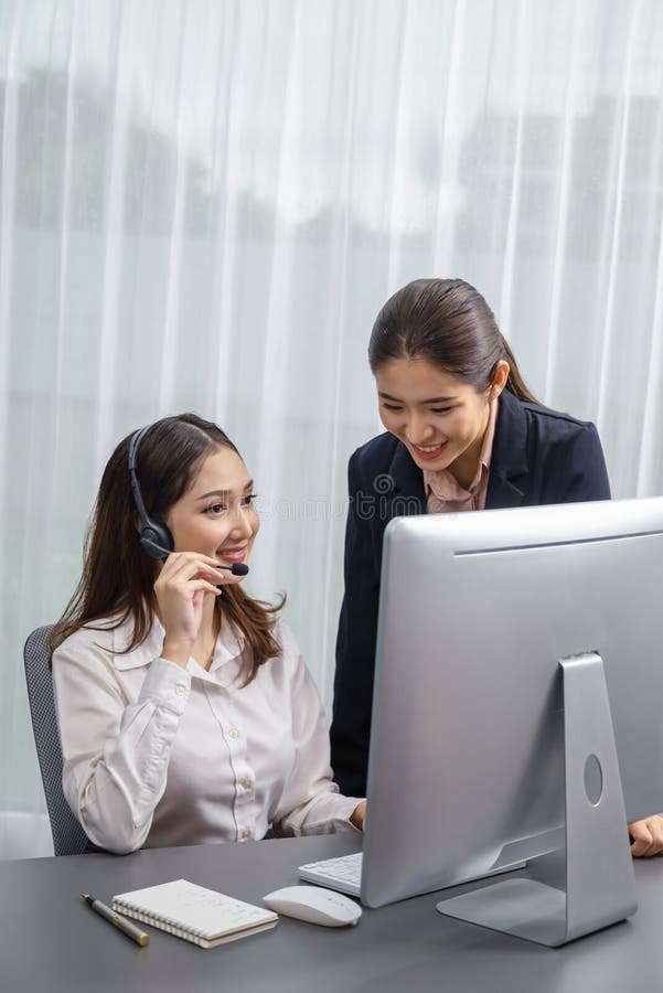 Asian Female Customer Support Operator Guided by Manger Enthusiastic ...