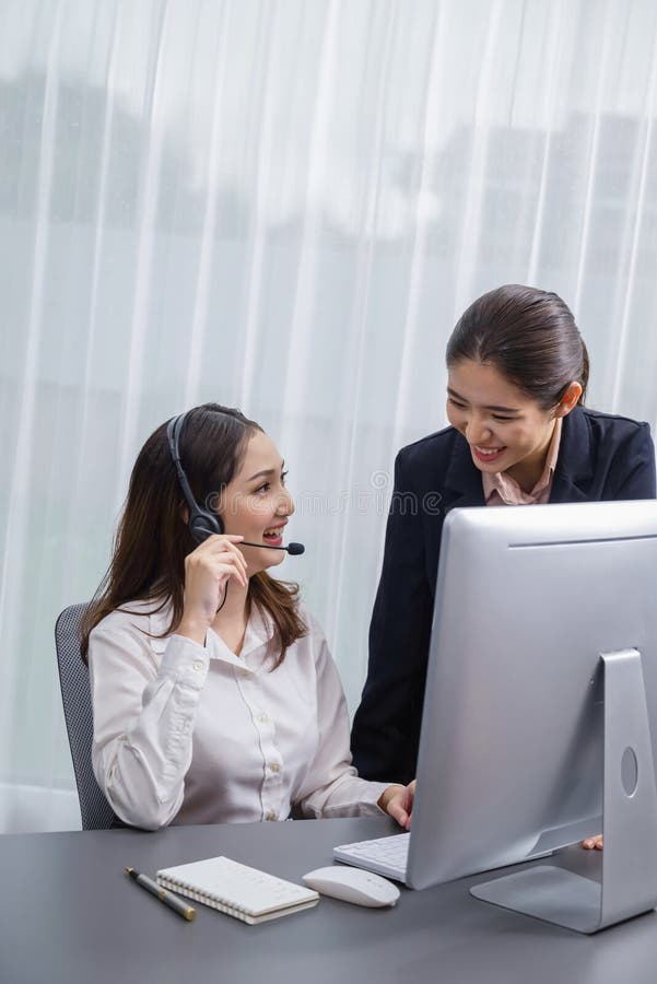 Asian Female Customer Support Operator Guided by Manger Enthusiastic ...