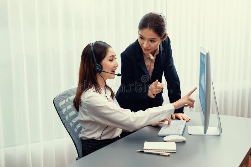 Asian Female Customer Support Operator Guided by Manger Enthusiastic ...