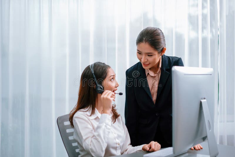 Asian Female Customer Support Operator Guided by Manger Enthusiastic ...
