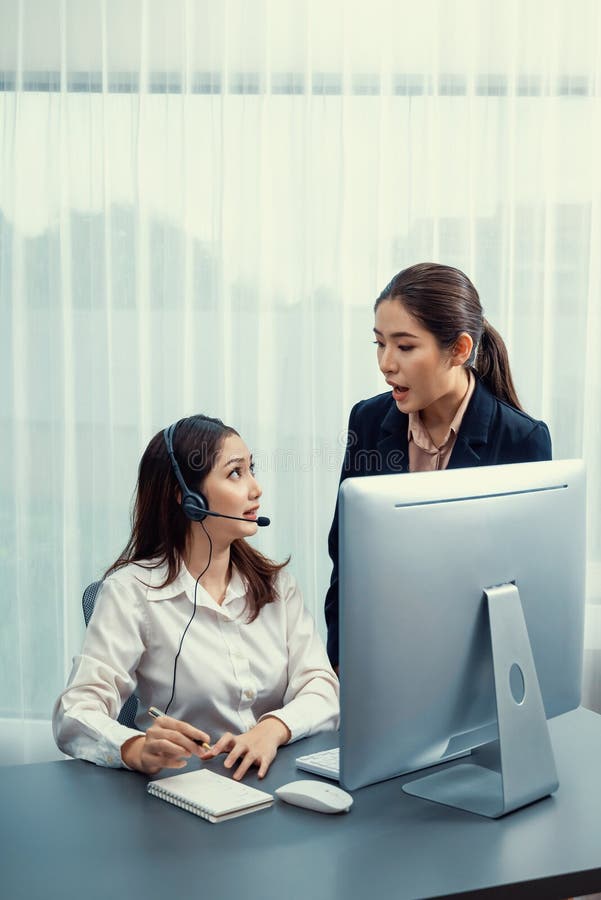 Asian Female Customer Support Operator Guided by Manger Enthusiastic ...