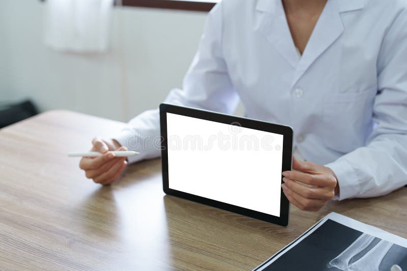 Asian Female Doctor Holds Computer Tablet To Customer, White Screen Can ...