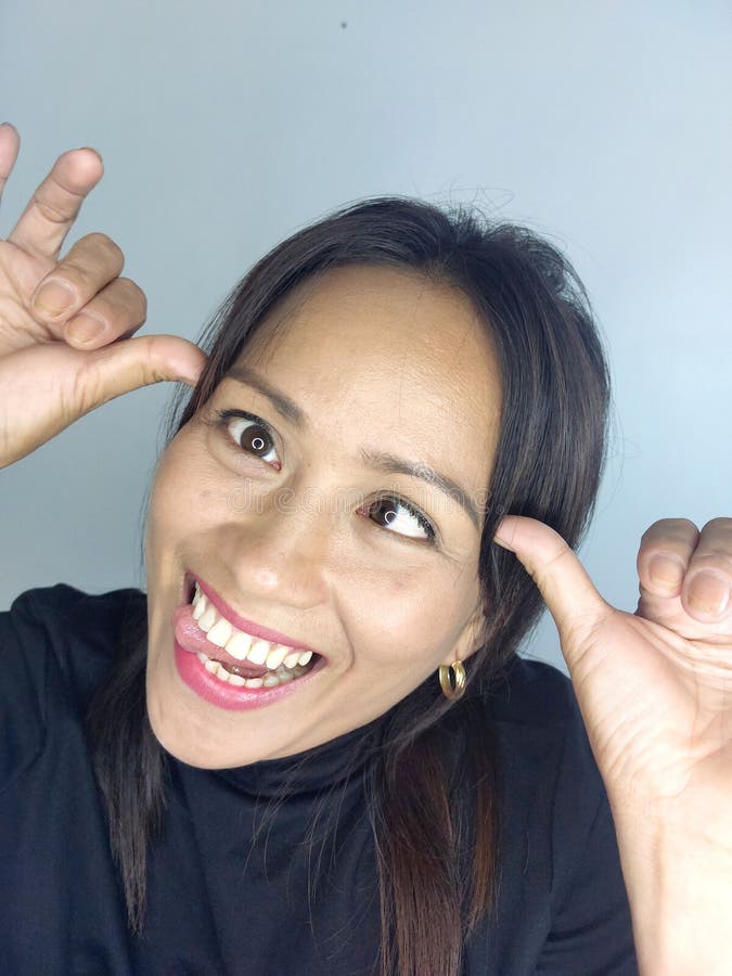 Asian Female Making Funny Faces Isolated Stock Photo - Image of silly ...