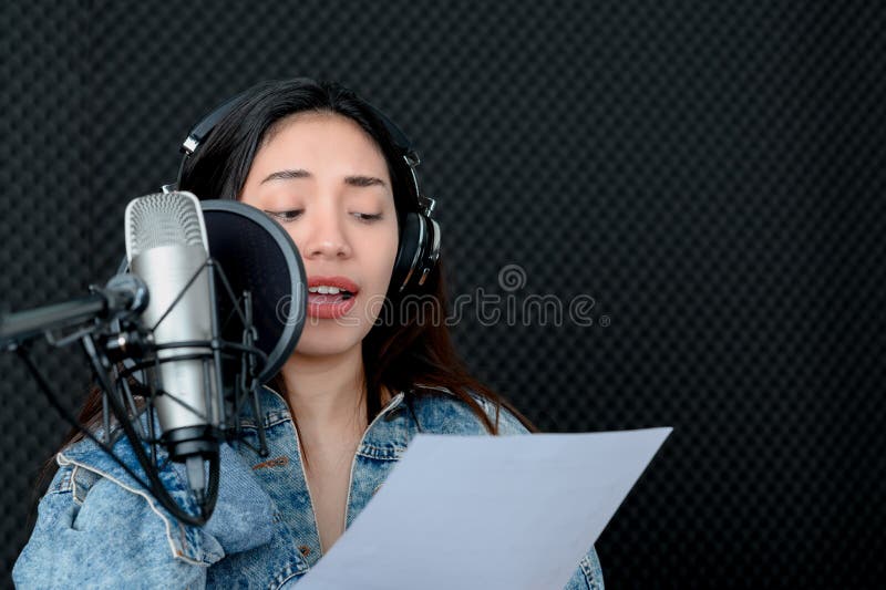 Asian Female Singer Singing in a Recording Studio. Female Singer ...