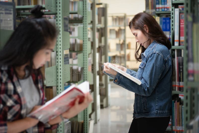Student Learning in the Library Stock Photo - Image of data, friends ...
