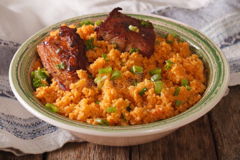 Spicy Bulgur with Beef Close-up on a Plate on the Table. Horizon Stock ...