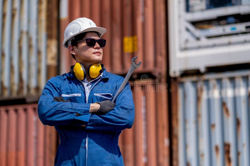 Asian Foreman or Cargo Container Worker with Holding Wrench Stand in ...