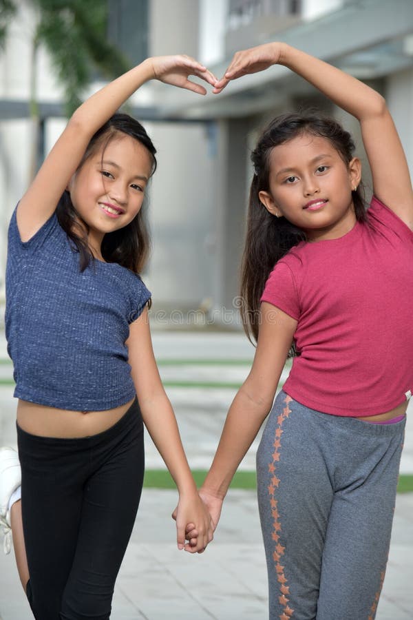 Asian Friends Making Heart Shape for Love Stock Photo - Image of pals ...