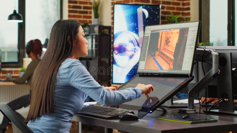 Asian Game Developer Working in Production Department Stock Photo ...