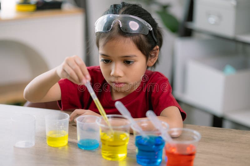 Asian Girl Doing Chemical Experiments at the Lab Stock Photo - Image of ...